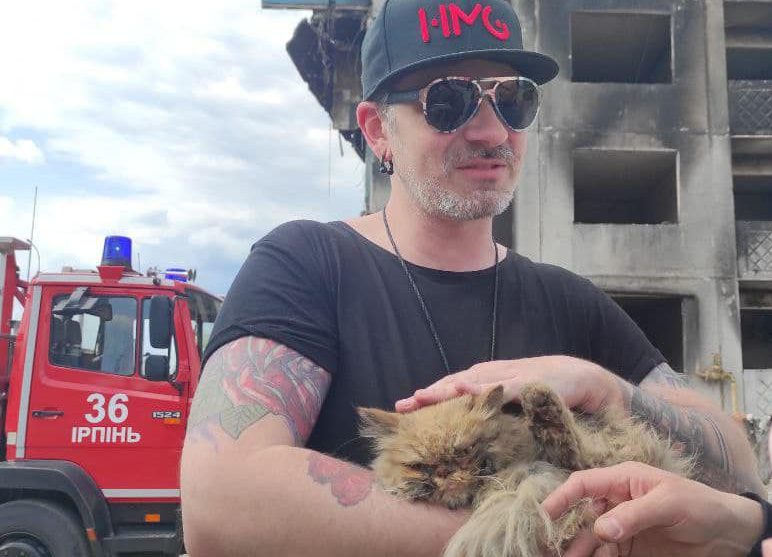 WATCH: Heartwarming moment cat is saved from building destroyed by ...