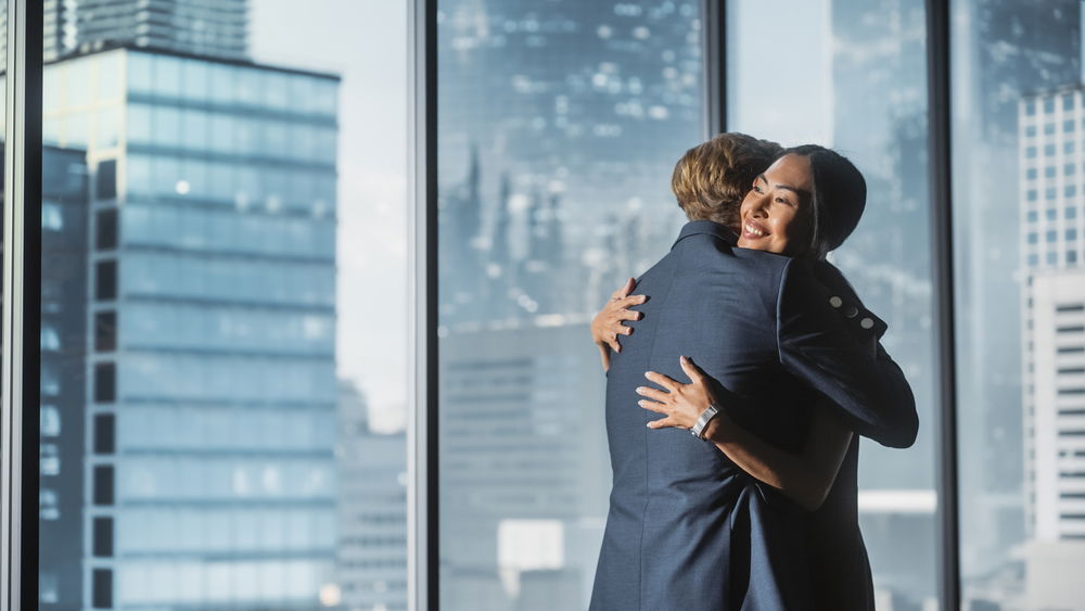 Hugging in the workplace - welcomed or weird? « Euro Weekly News